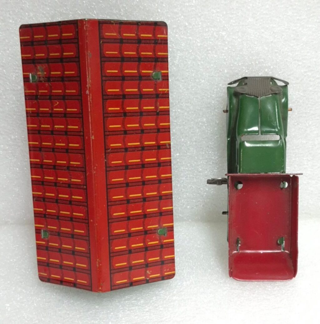 1930’s Marx Pressed Steel Wind-Up Dump Truck and Tin Litho Garage – The ...
